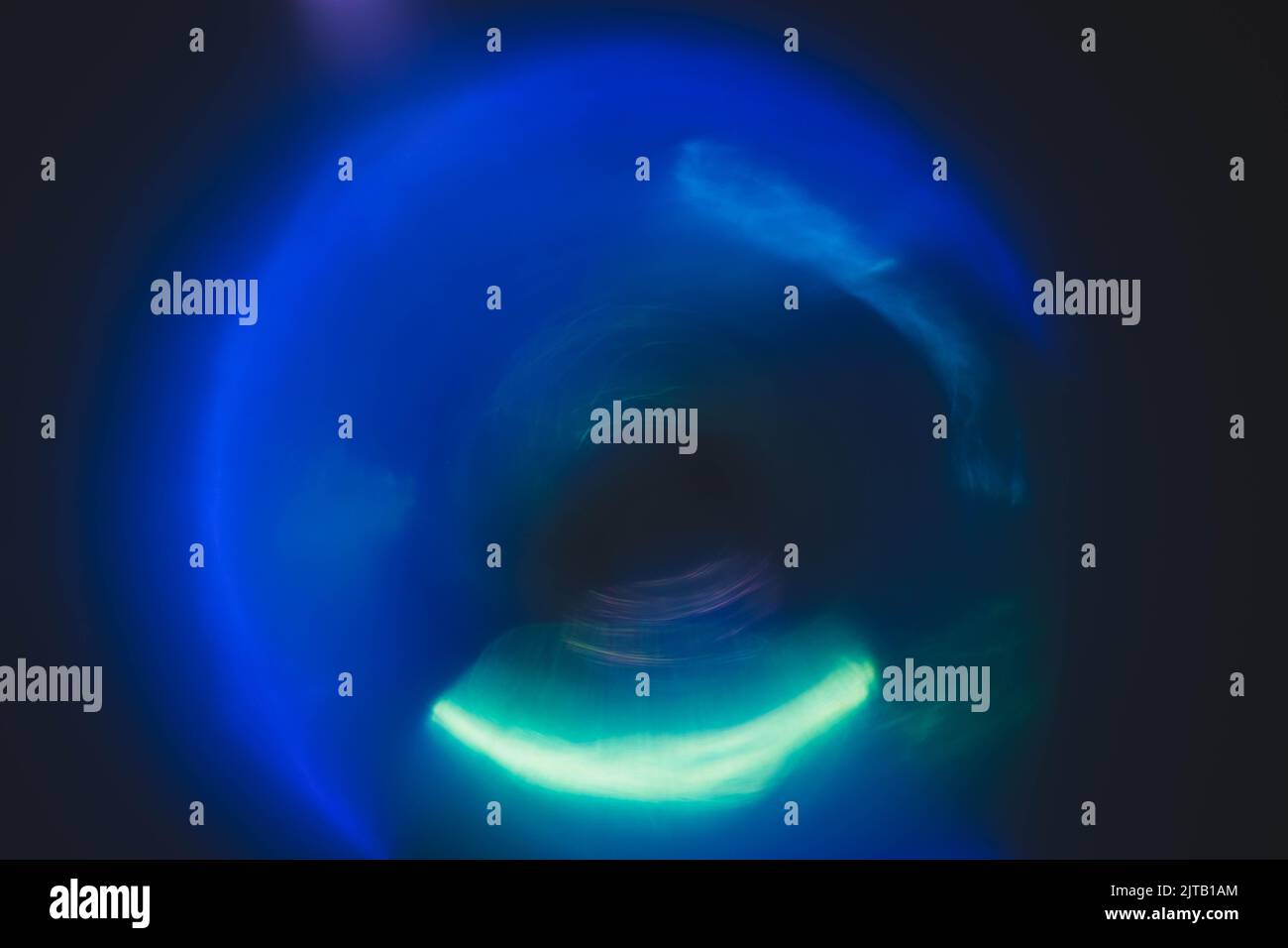 blur neon blue glow lens flare dark circle light Stock Photo - Alamy