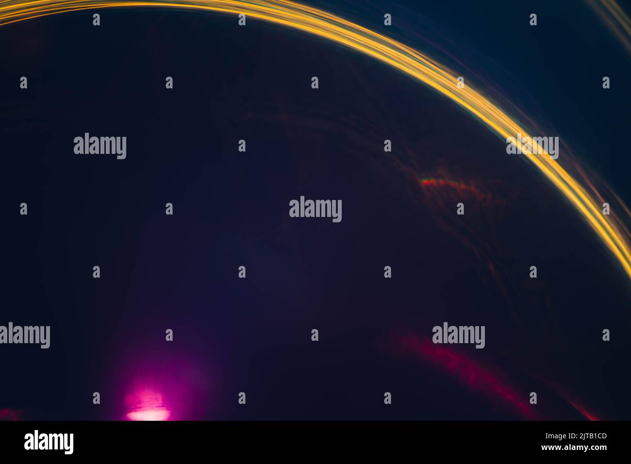 yellow arc lines purple glow dark background Stock Photo - Alamy