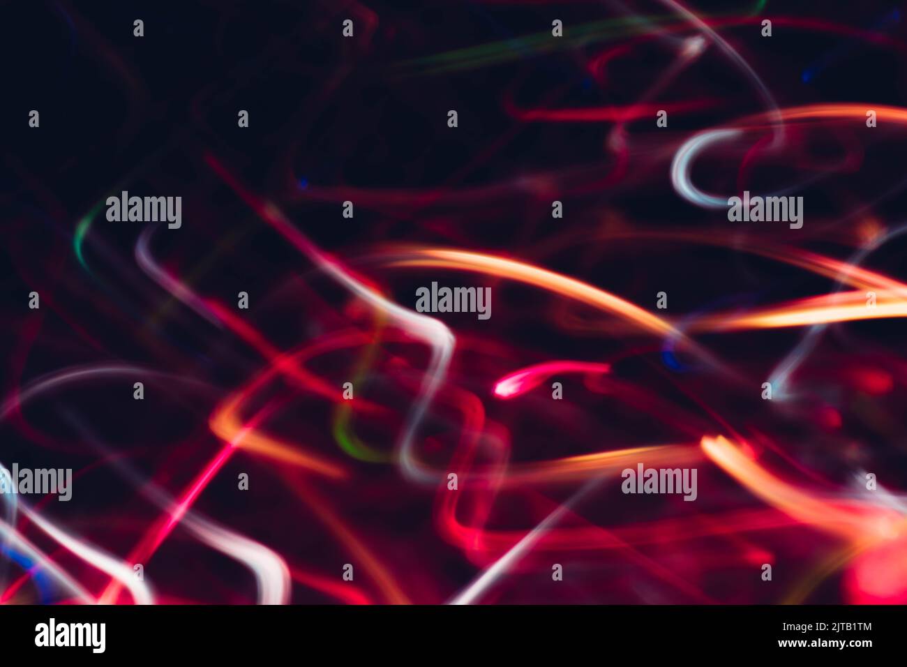 neon magenta purple lights glowing curvy lines Stock Photo - Alamy