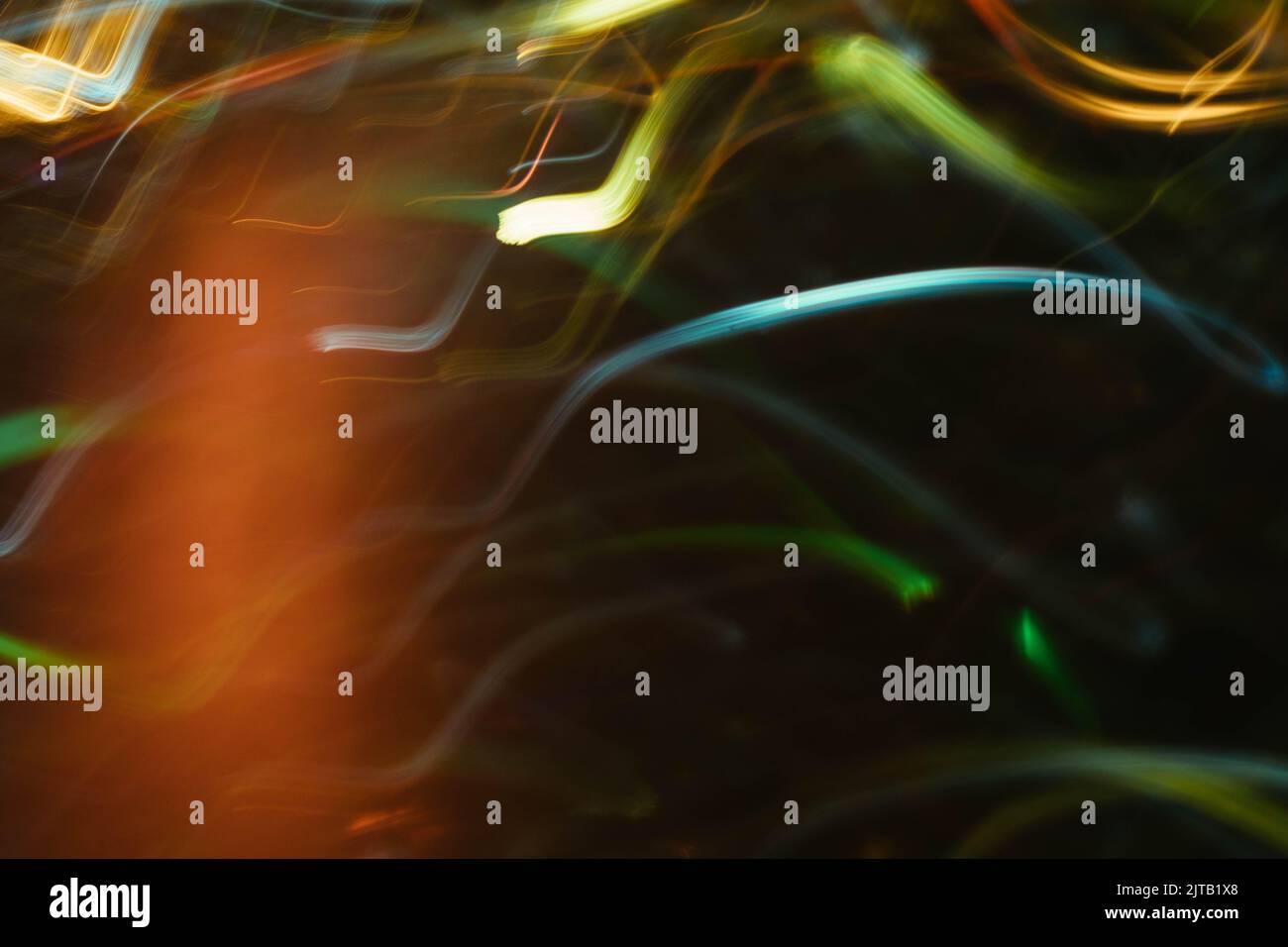 neon multicolor glowing curvy lines blur lights Stock Photo - Alamy