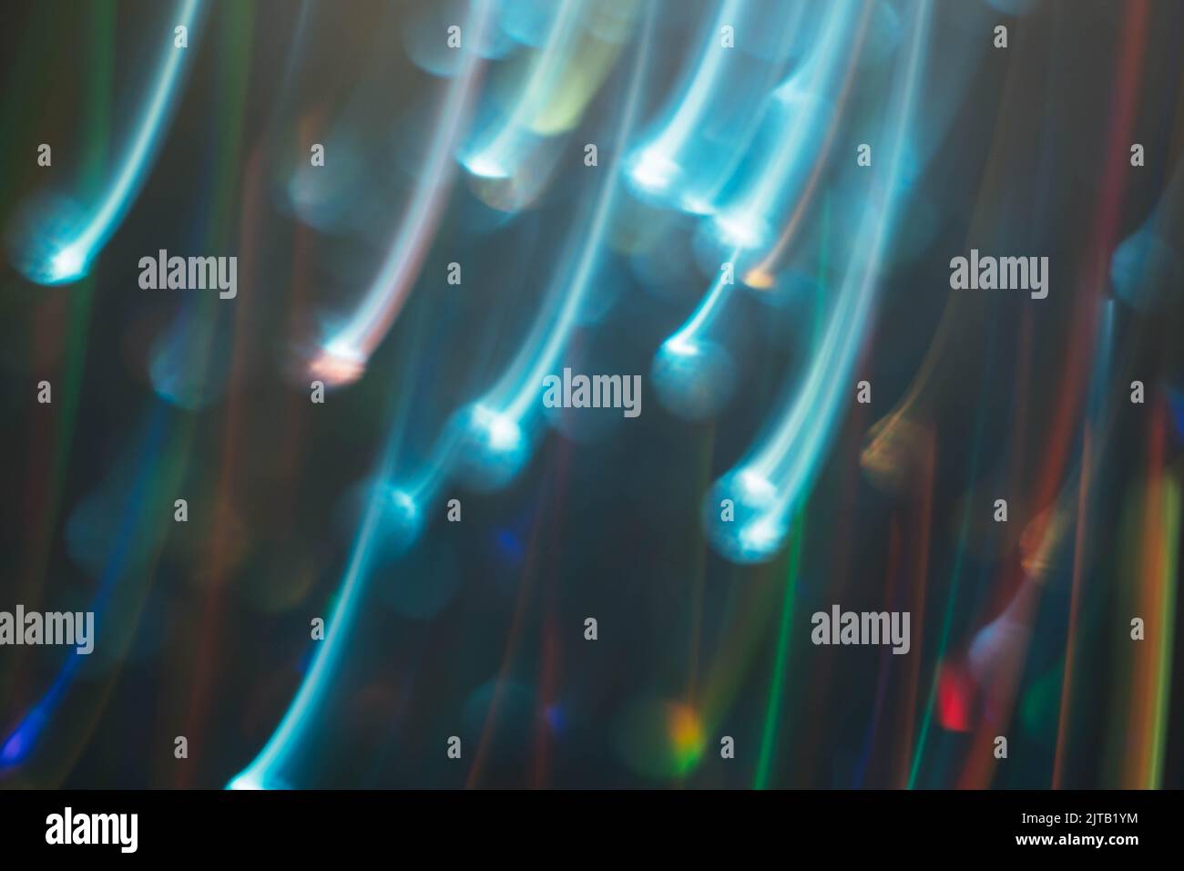 neon multicolor glowing lines falling blue sparks Stock Photo - Alamy