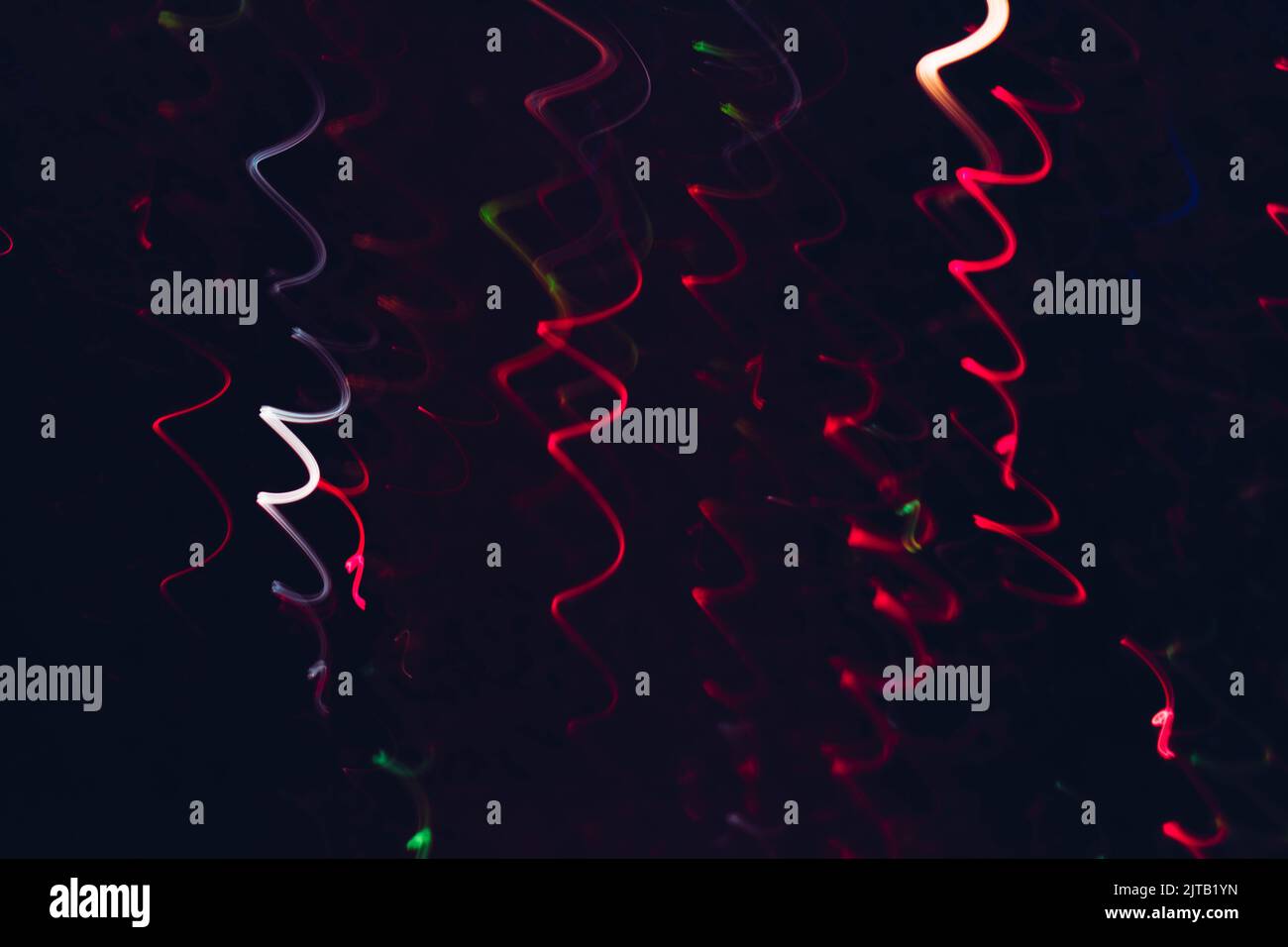 neon magenta glowing lines blur lights reflection Stock Photo - Alamy