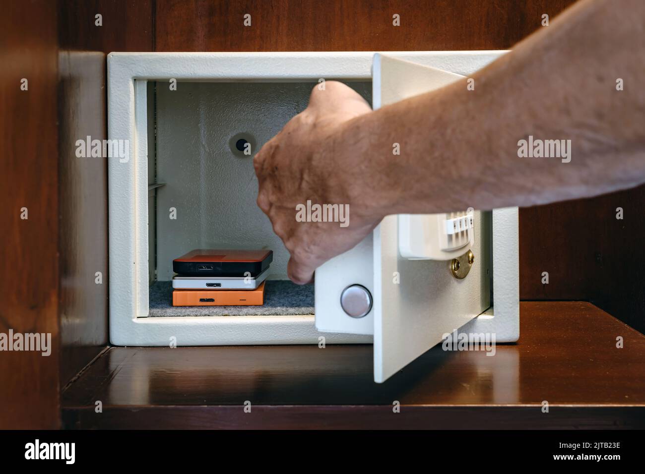 Security external hard drive in open metal safe. External hard disk ...