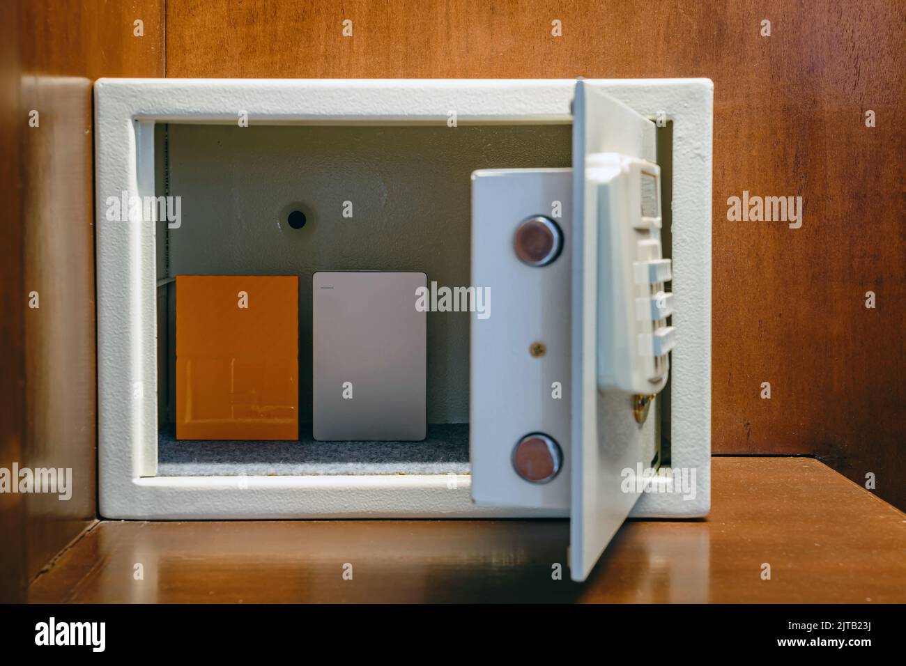 Security external hard drive in open metal safe. External hard disk ...