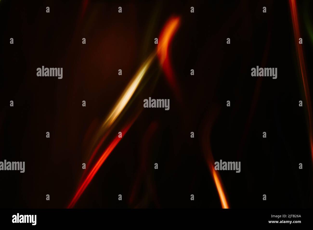blur red orange lines defocused fire rays dark Stock Photo - Alamy