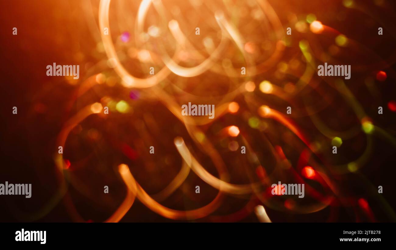 blur orange illuminated swirly lines colored sparks Stock Photo - Alamy