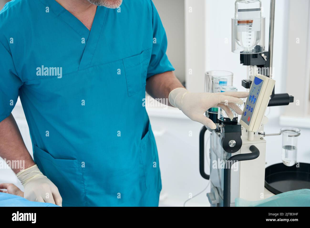 Diagnostician works with contrast control injector in modern ...