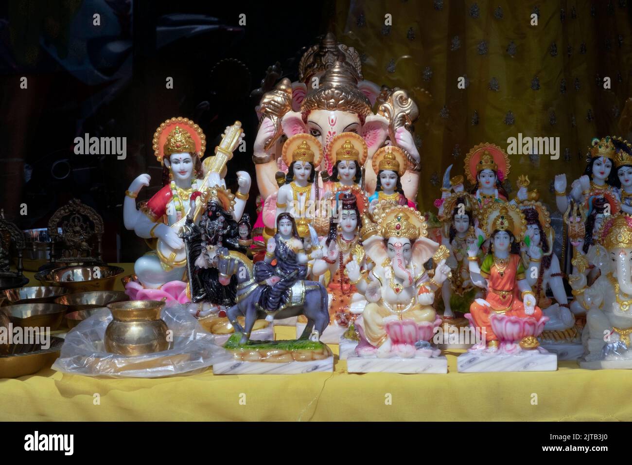 A collection of statues of Hindu deities to be used for home worship ...