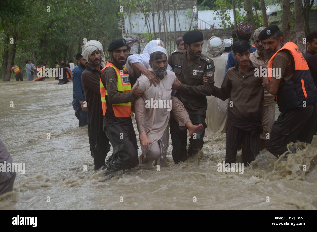 Peshawar, Pakistan. 26th Aug, 2022. Torrential rains and storms cause ...