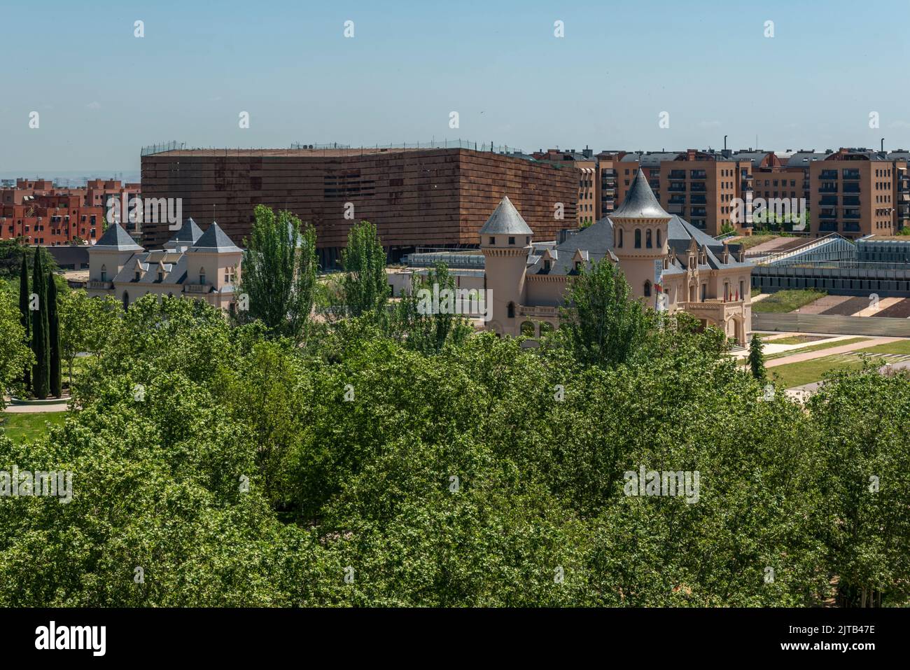 View of a park, some castles and modern residential buildings in the ...