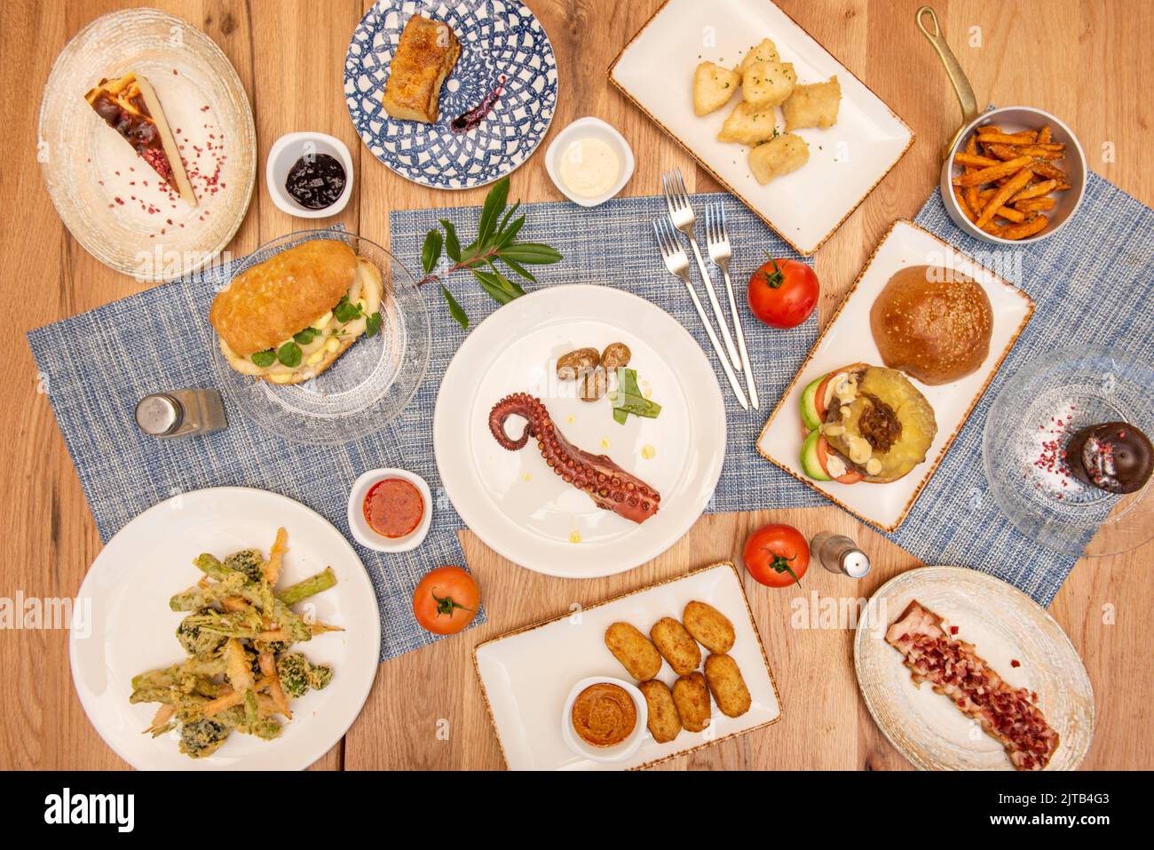 Set of dishes of Spanish recipes and tapas with a modern touch, cod ...