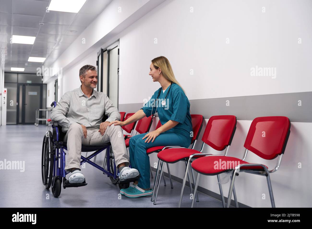Doctor is friends with patient hi-res stock photography and images - Alamy