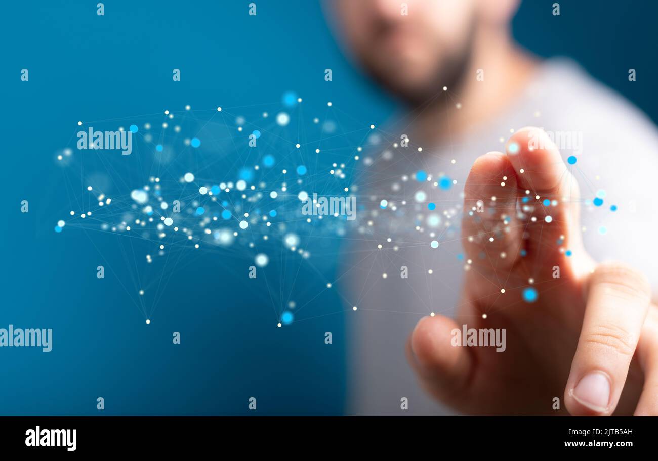 An out-of-focus man using his fingers to swipe on the screen with sci ...