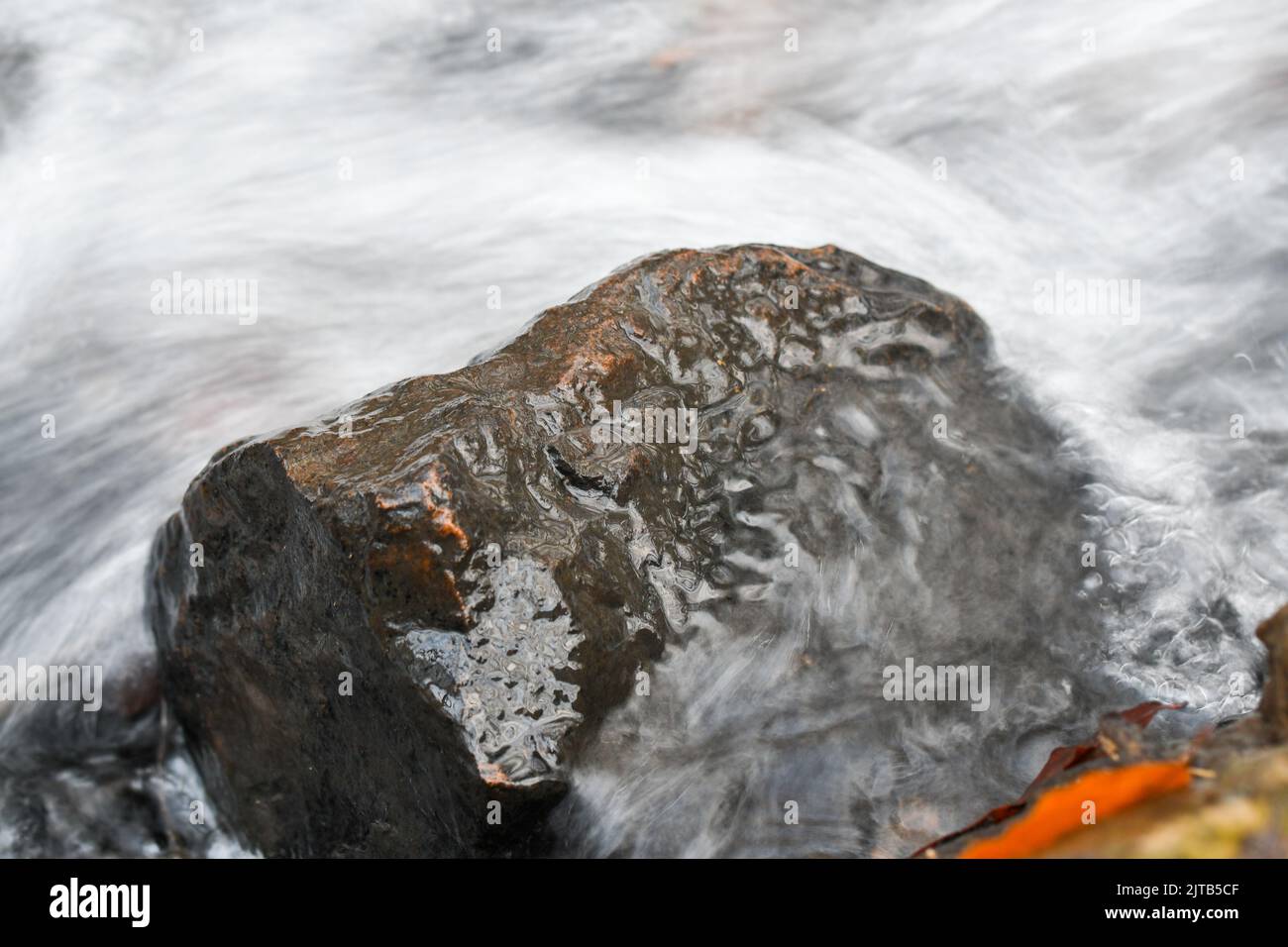 Water flowing into a rock hi-res stock photography and images - Alamy