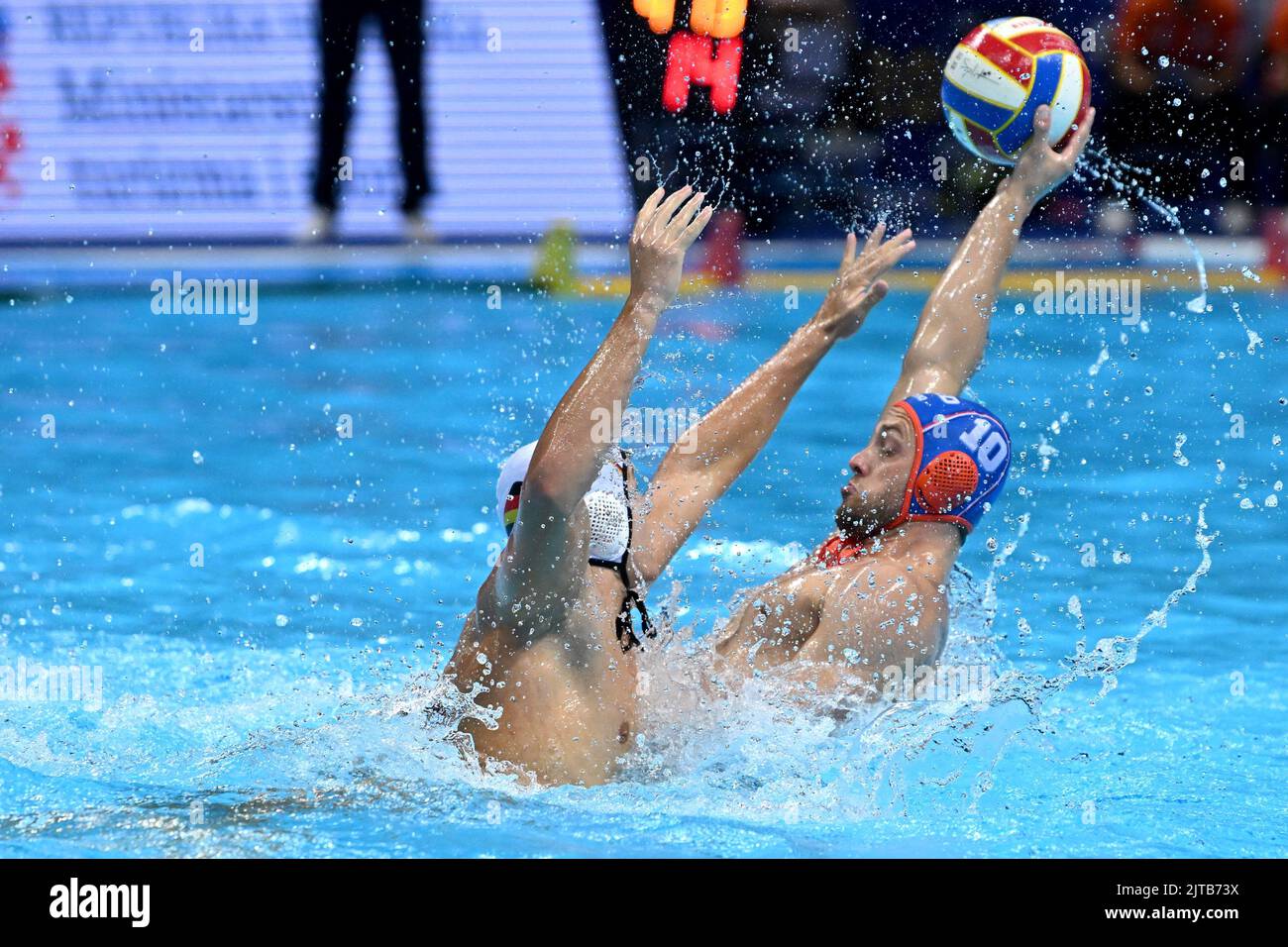 Pascal Janssen of Netherlands in action against Mark Gansen of Germany ...