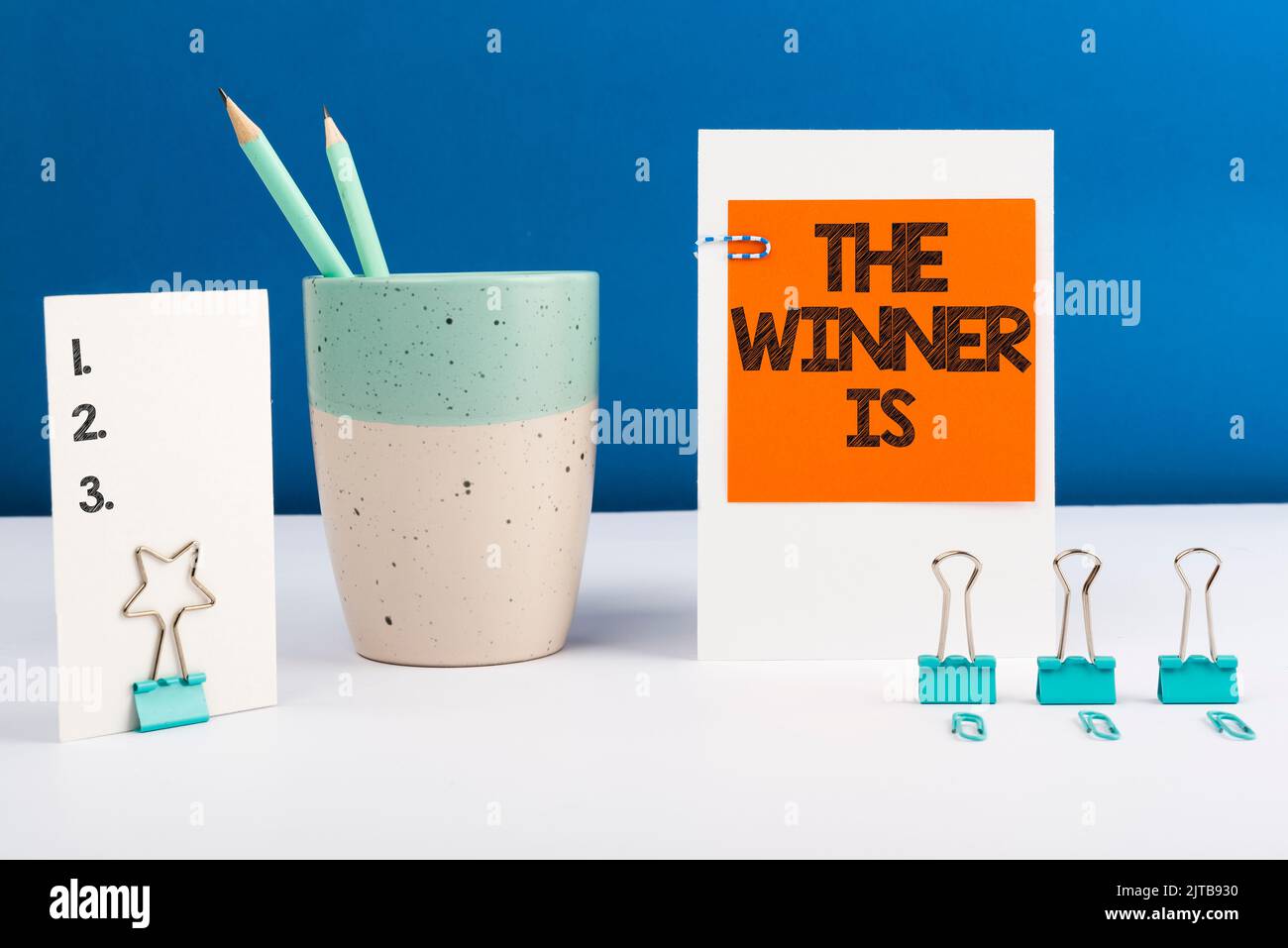 Conceptual caption The Winner Is.... Business showcase Announcing who ...