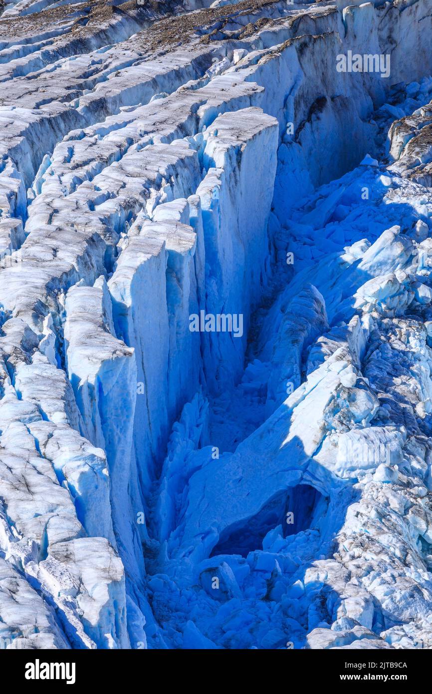 Crevasses and seracs at the foot of a glacier Stock Photo - Alamy