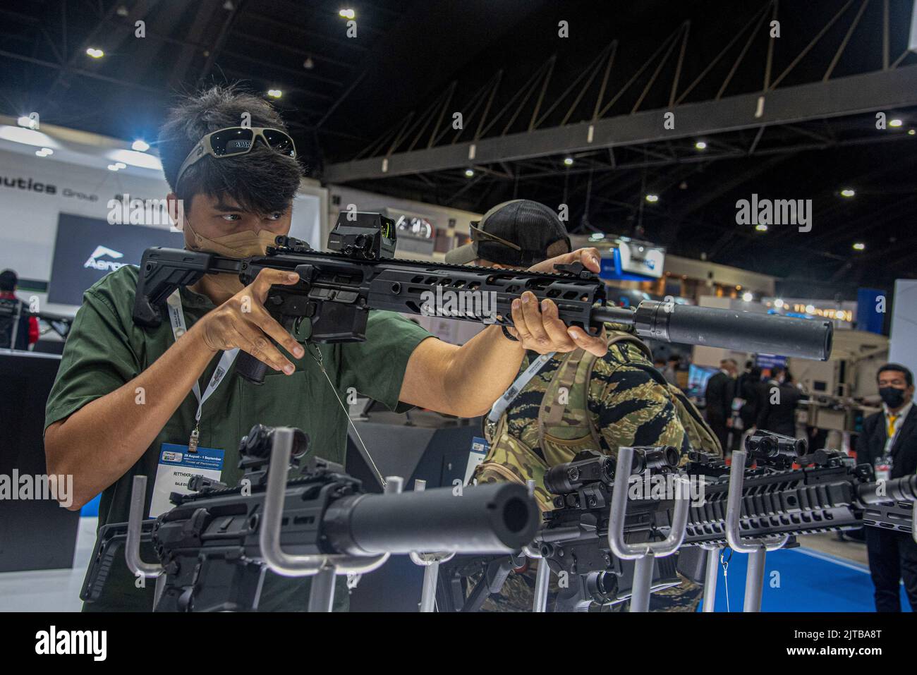 Nonthaburi, Thailand. 29th Aug, 2022. A visitor experiences a weapon during the exhibition. The ...