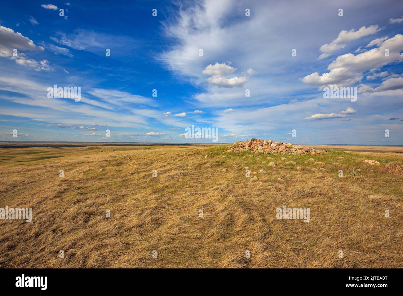 The central stone cairn of the 5000-year old Majorville Medicine Wheel ...