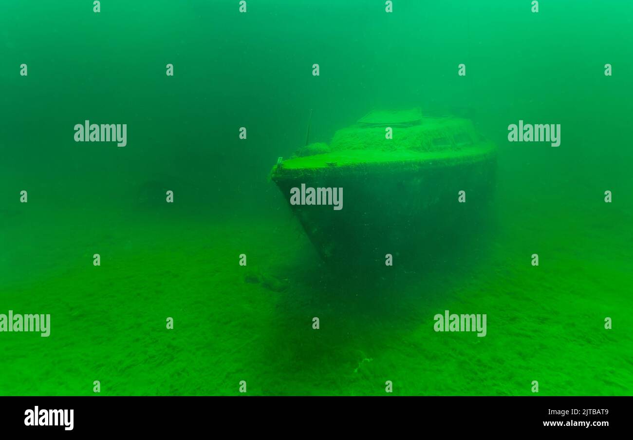 Gloomy underwater wreck of recreational speed boat Stock Photo - Alamy