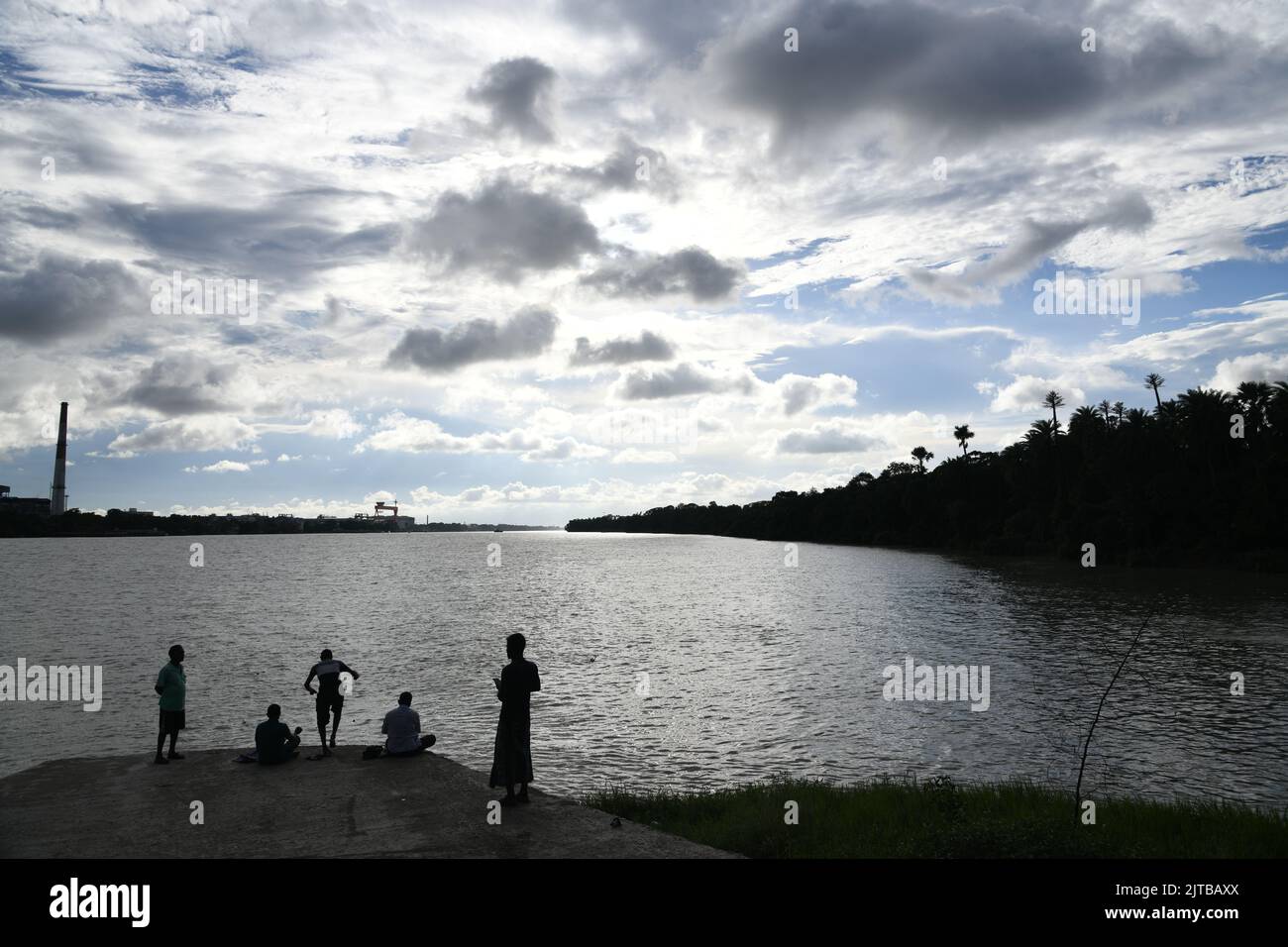 Monsoon clouds over the Ganges from Botanical Garden ghat. Howrah, West ...