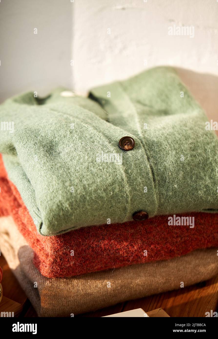 Sweaters in pile hi-res stock photography and images - Alamy