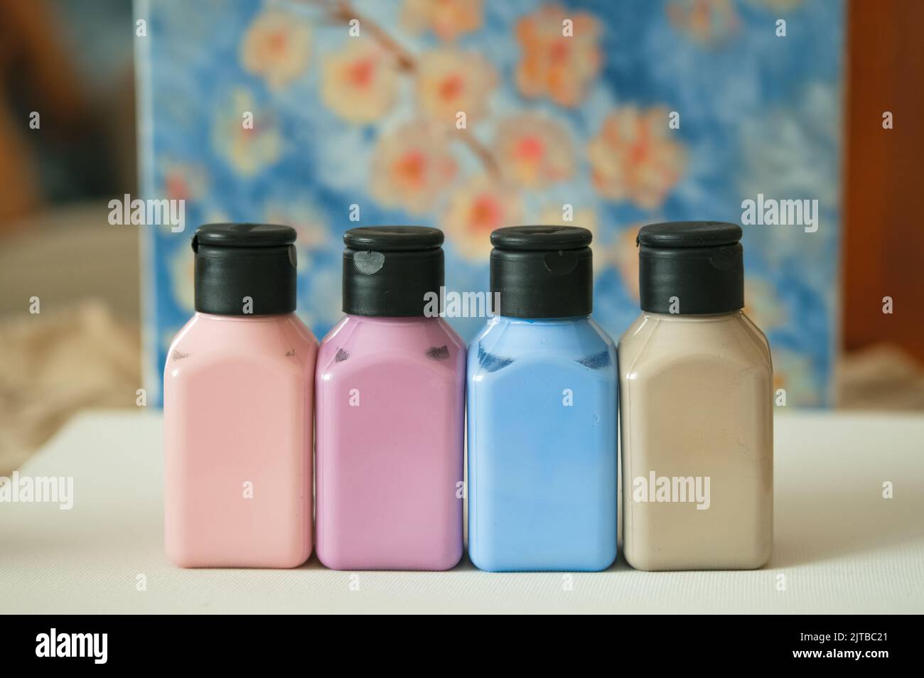 Set of pastel acrilic paint jars in white canvas Stock Photo - Alamy