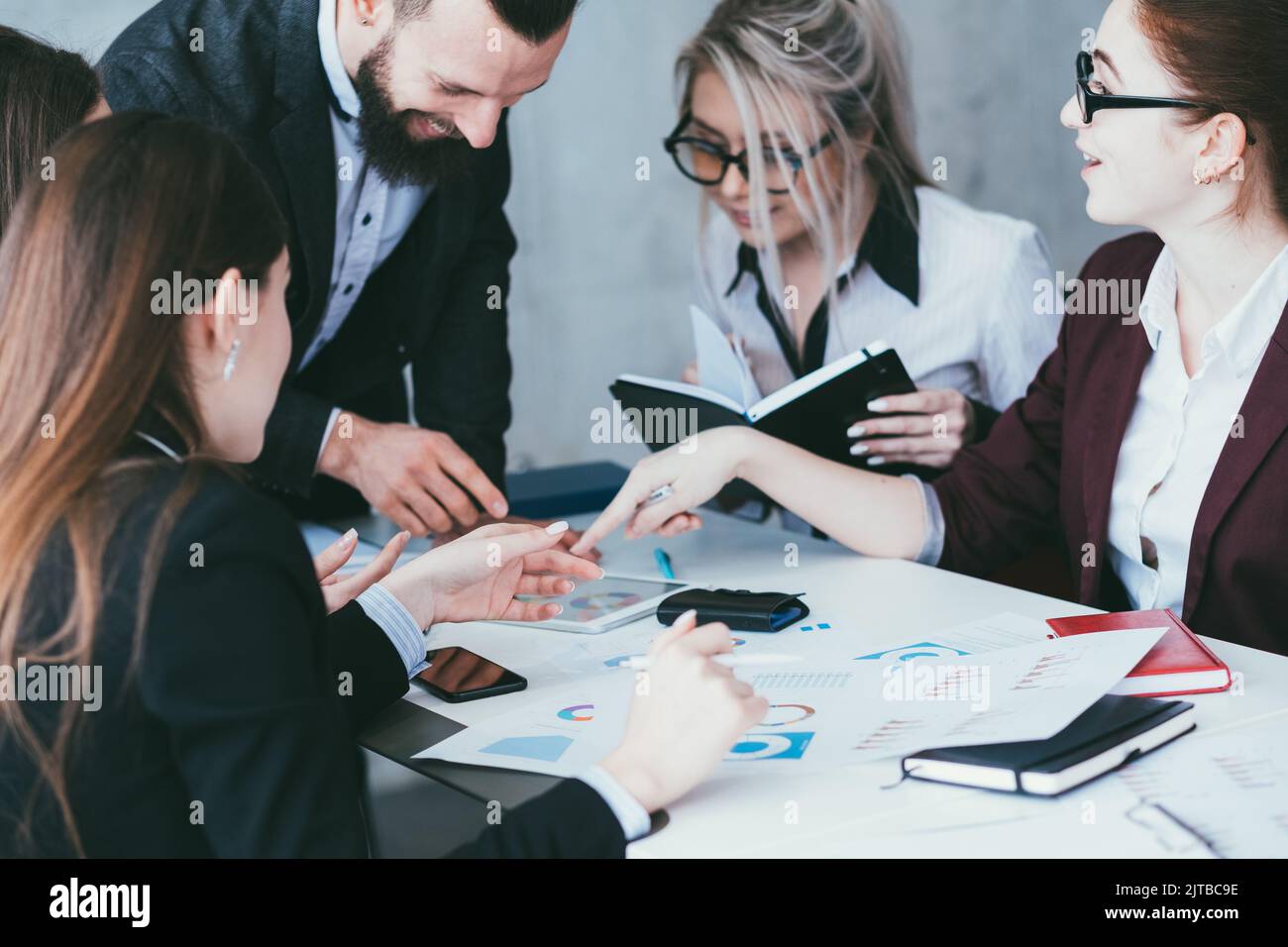 sale analysis corporate growth rate discuss tablet Stock Photo - Alamy