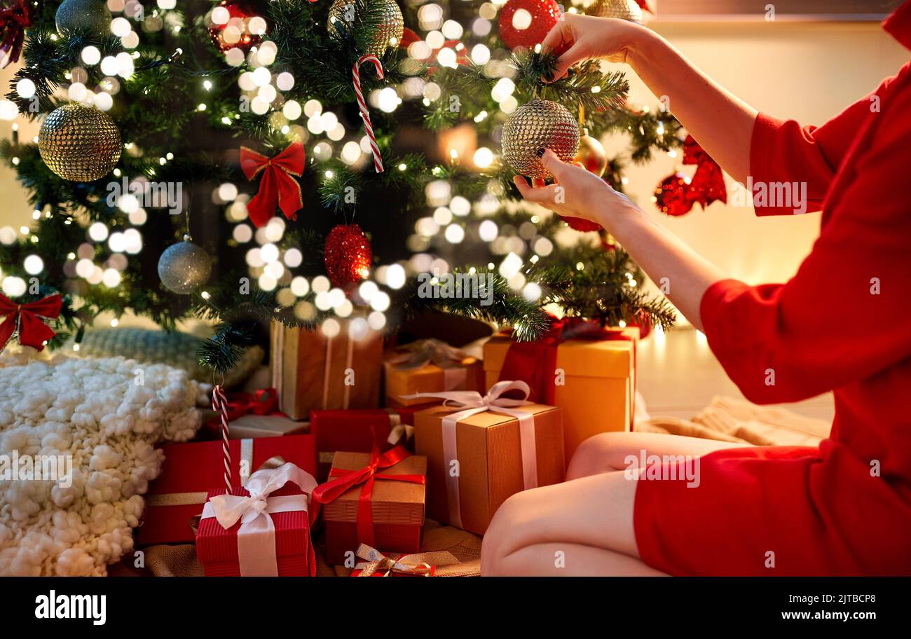 Female hands decorating golden garland hi-res stock photography and ...