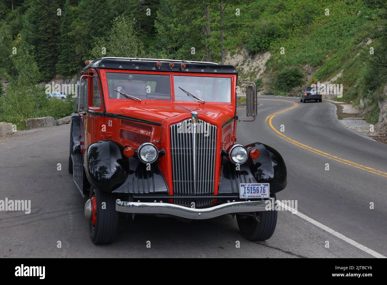 The famous Red Bus in Glacier National Park Stock Photo - Alamy
