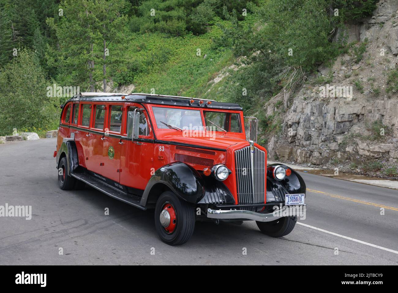 The famous Red Bus in Glacier National Park Stock Photo - Alamy