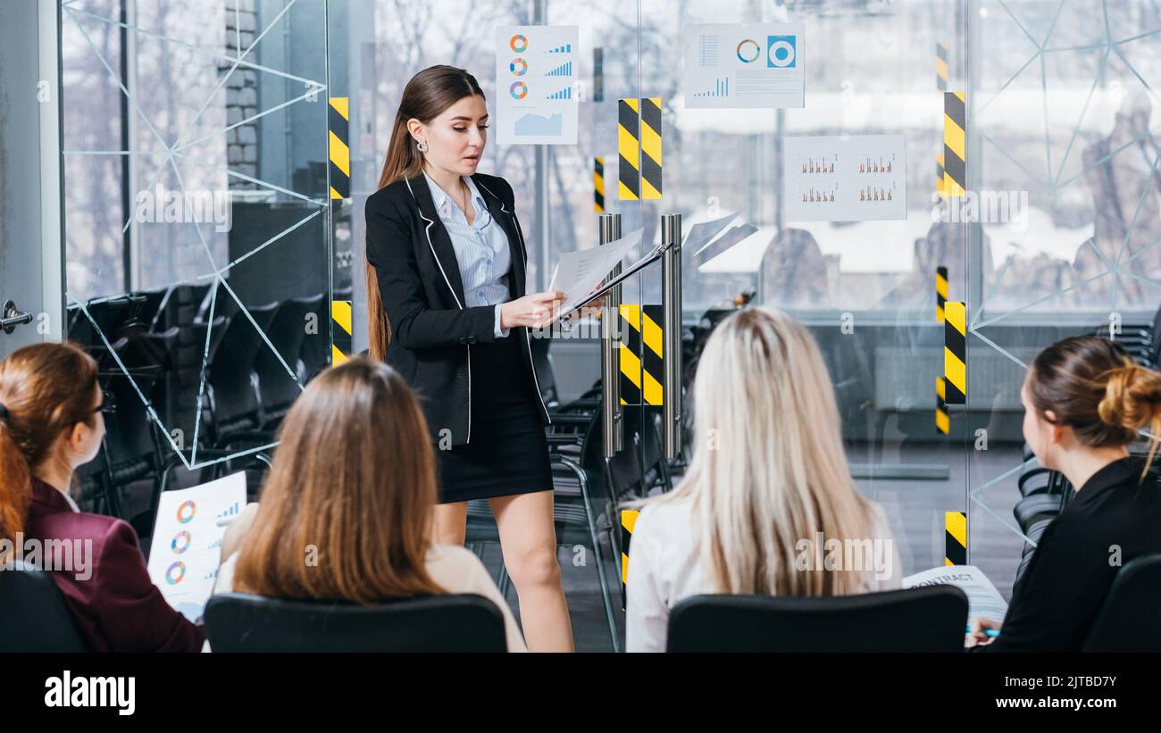 sale analysis business meeting room speaker report Stock Photo - Alamy