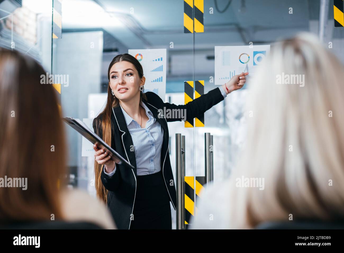 sale analysis business meeting room speaker report Stock Photo - Alamy
