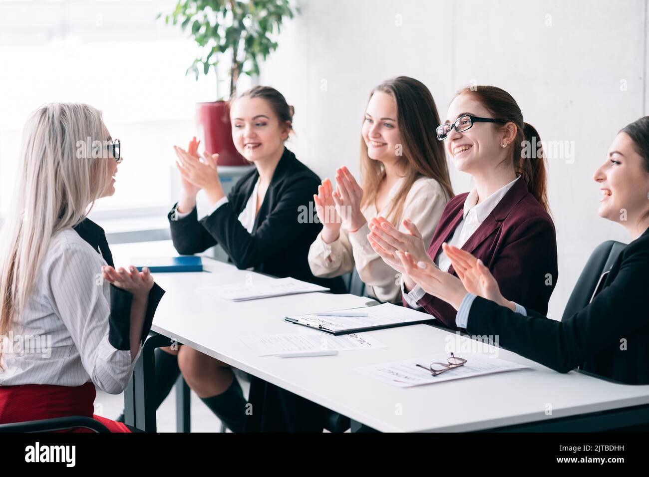 hiring successful job interview hr female clapping Stock Photo - Alamy