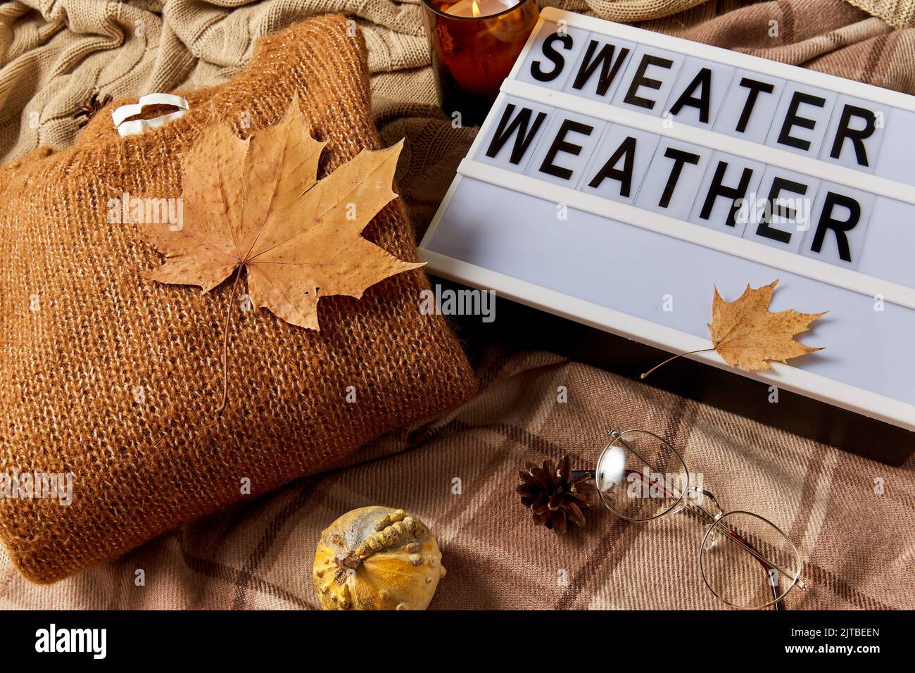 light box with sweater weather letters in autumn Stock Photo - Alamy