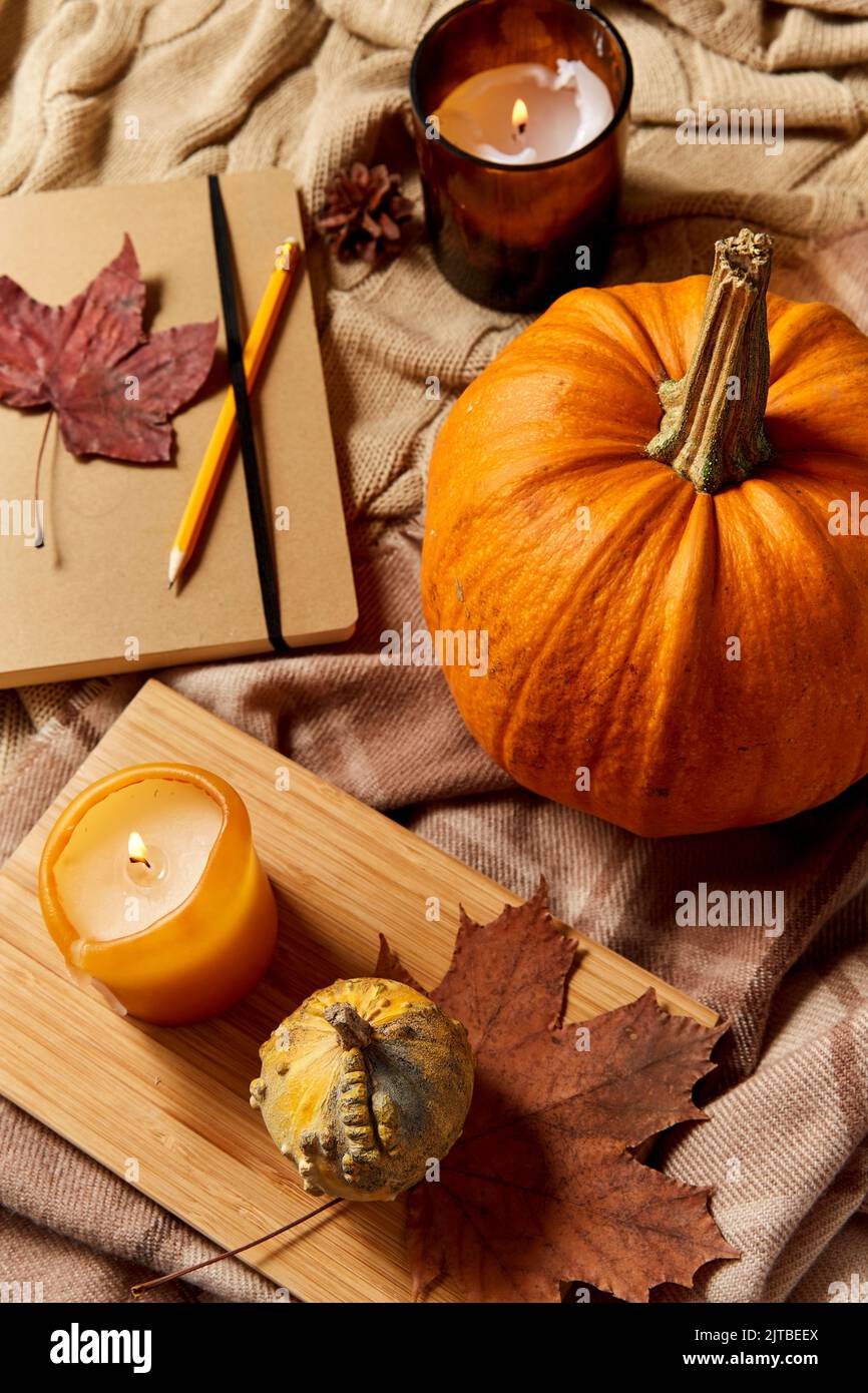 pumpkins, diary, pencil, autumn leaves and candles Stock Photo - Alamy