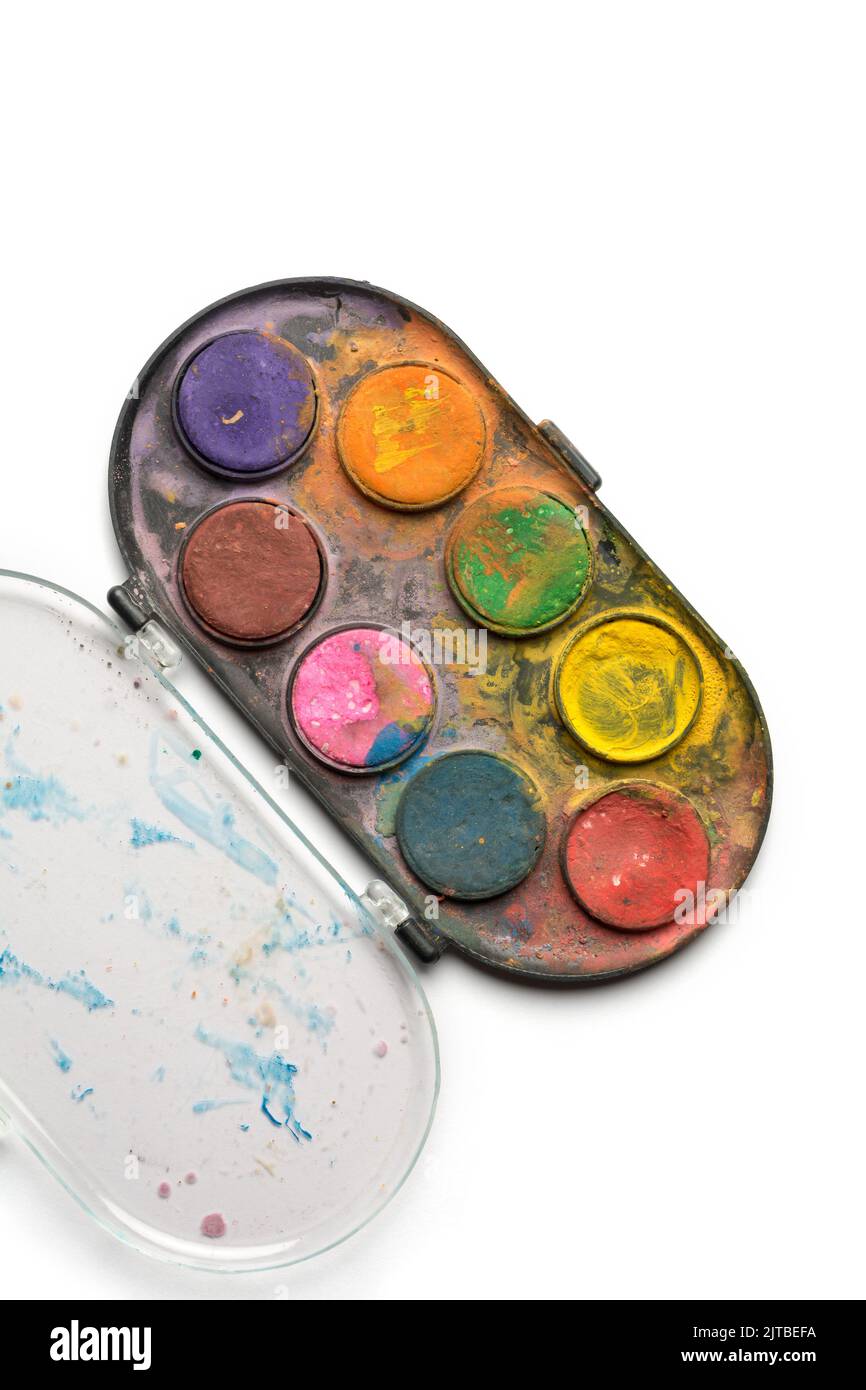 close-up of used and dirty box of watercolor paints, isolated on white ...