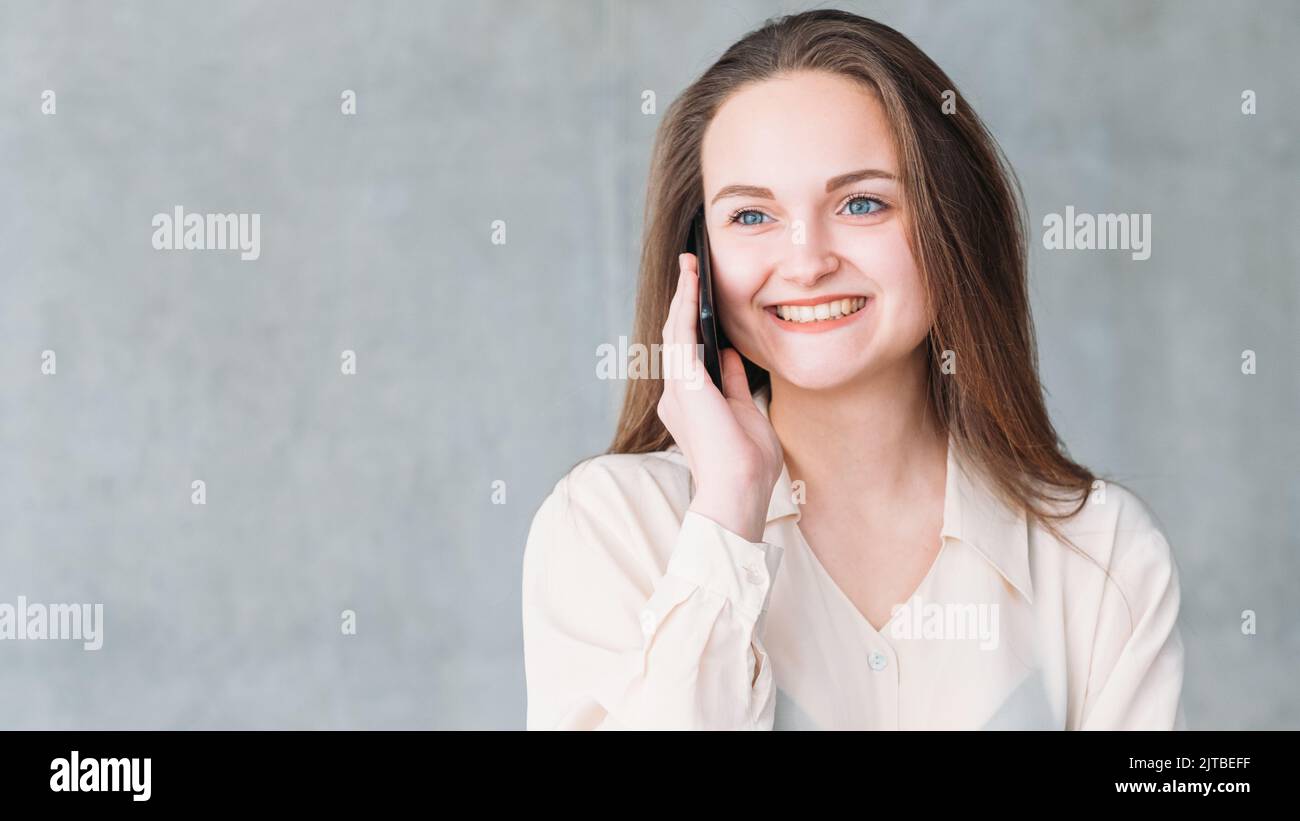 good news happy woman phone copy space Stock Photo - Alamy