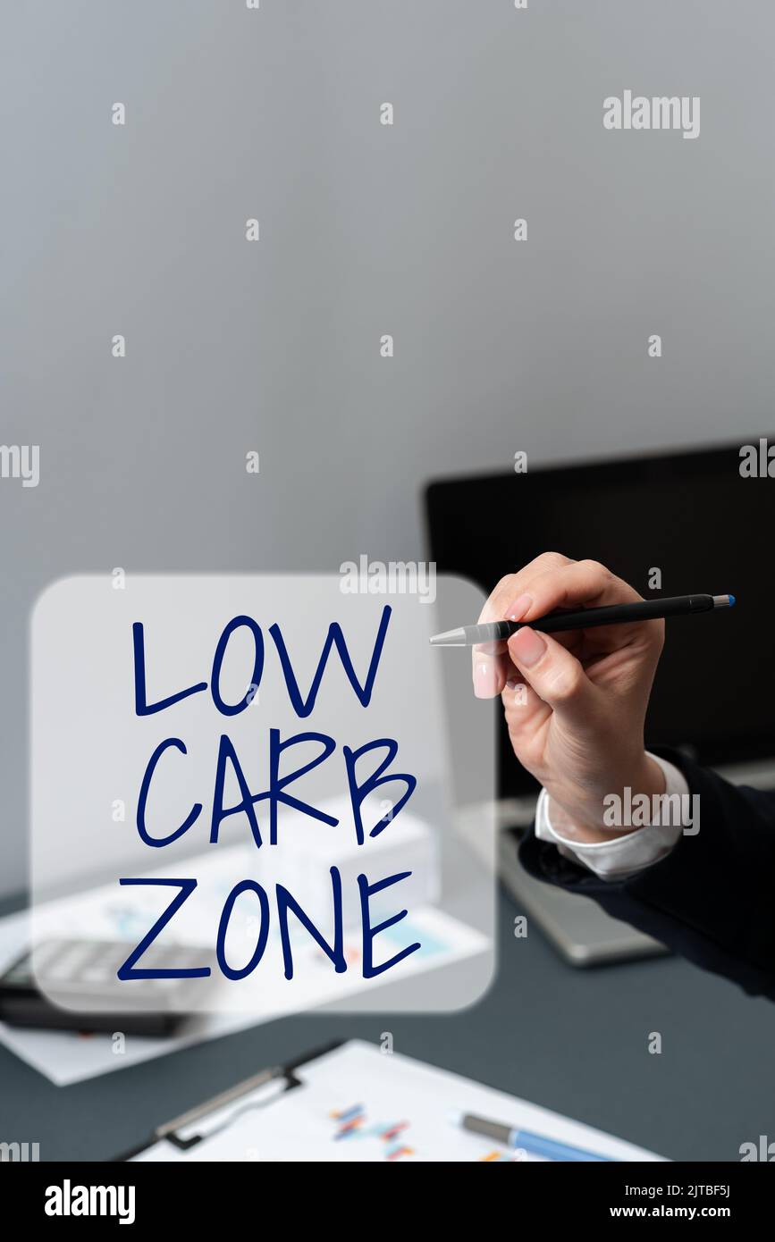 Hand writing sign Low Carb Zone. Internet Concept Healthy diet for ...
