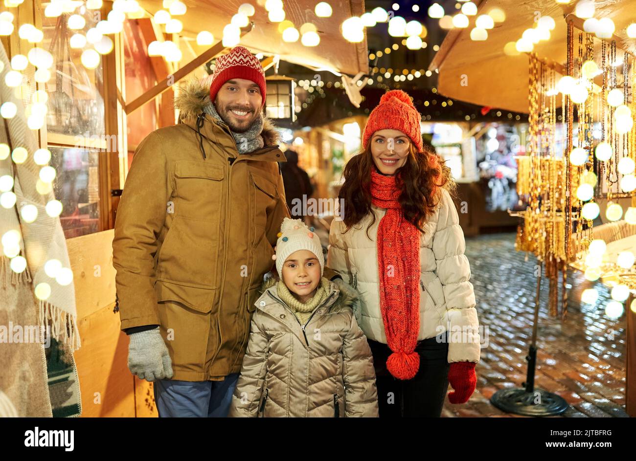 happy family at christmas market in city Stock Photo - Alamy
