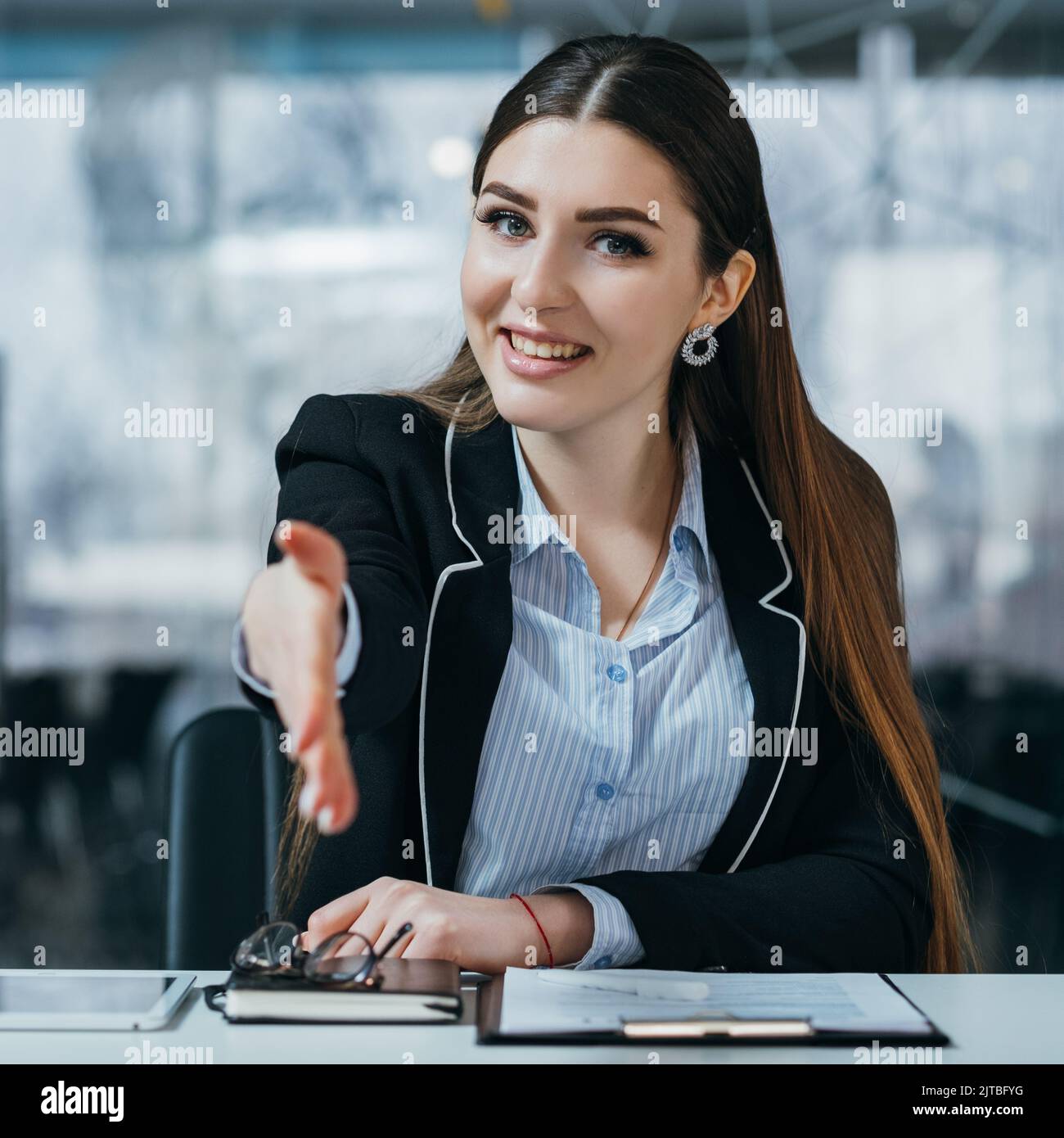 confident company headhunter welcome workplace Stock Photo - Alamy