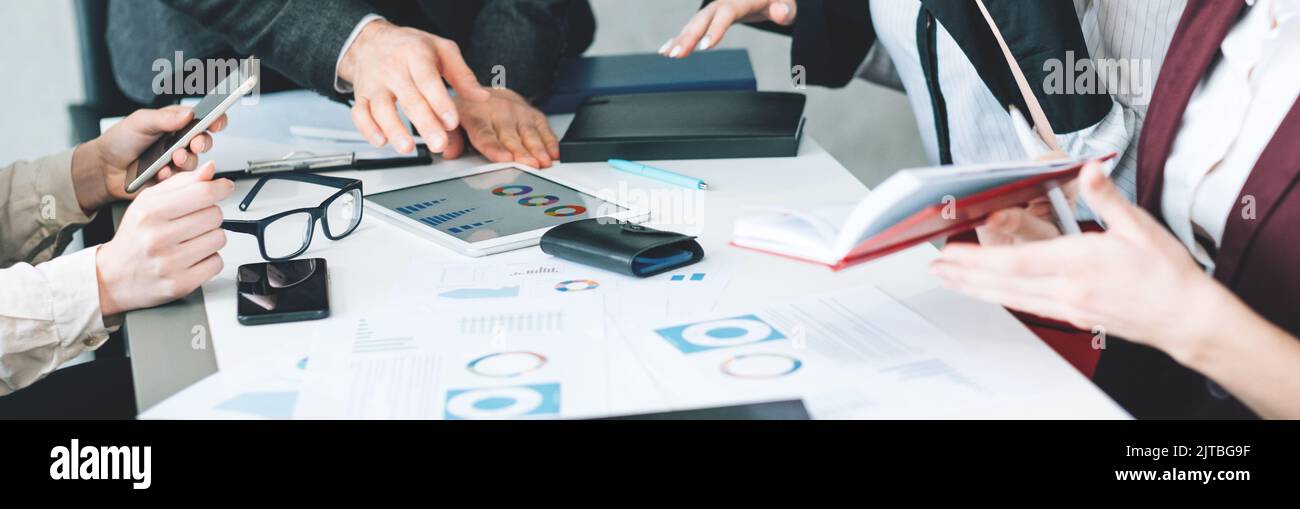 business team office meeting discussion graphs Stock Photo - Alamy