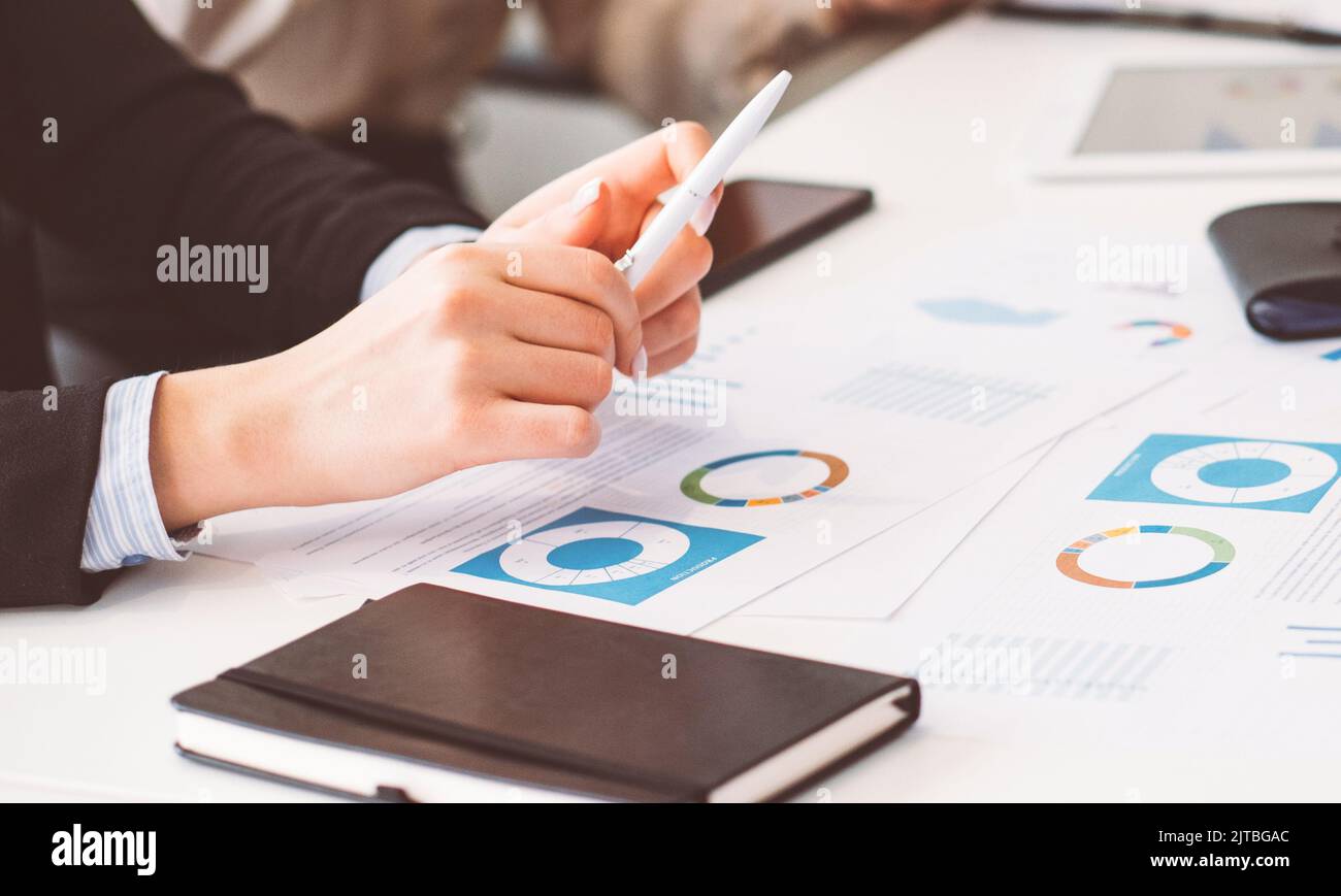 business meeting analysis paperwork female hands Stock Photo - Alamy