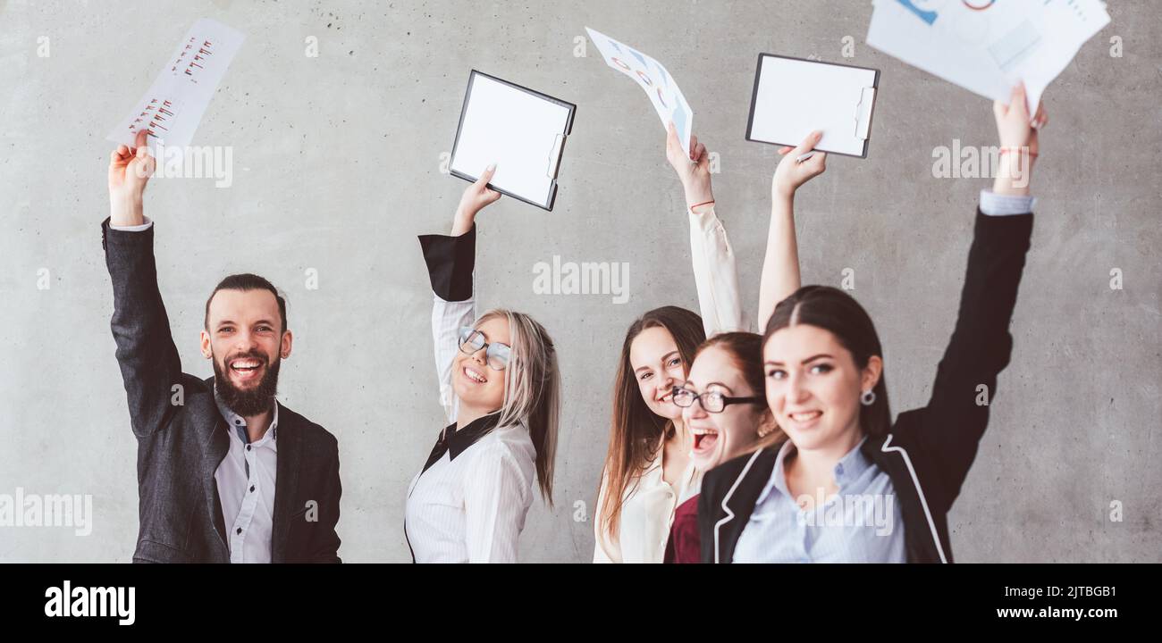 business team success celebration smiling hand air Stock Photo - Alamy