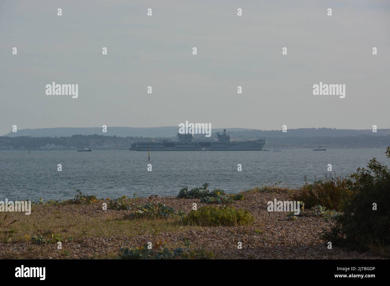 The Royal Navy aircraft carrier HMS Prince of Wales returning to the ...