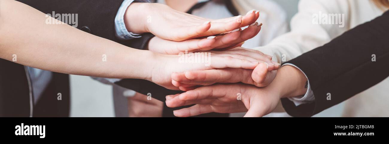female support power motivation team hand together Stock Photo - Alamy