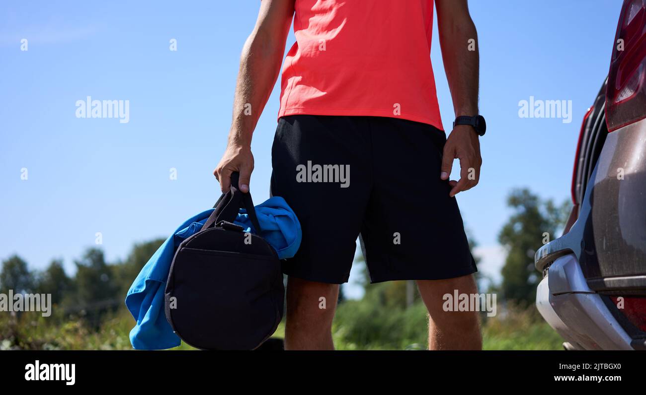 Athlete getting out of car hi-res stock photography and images - Alamy
