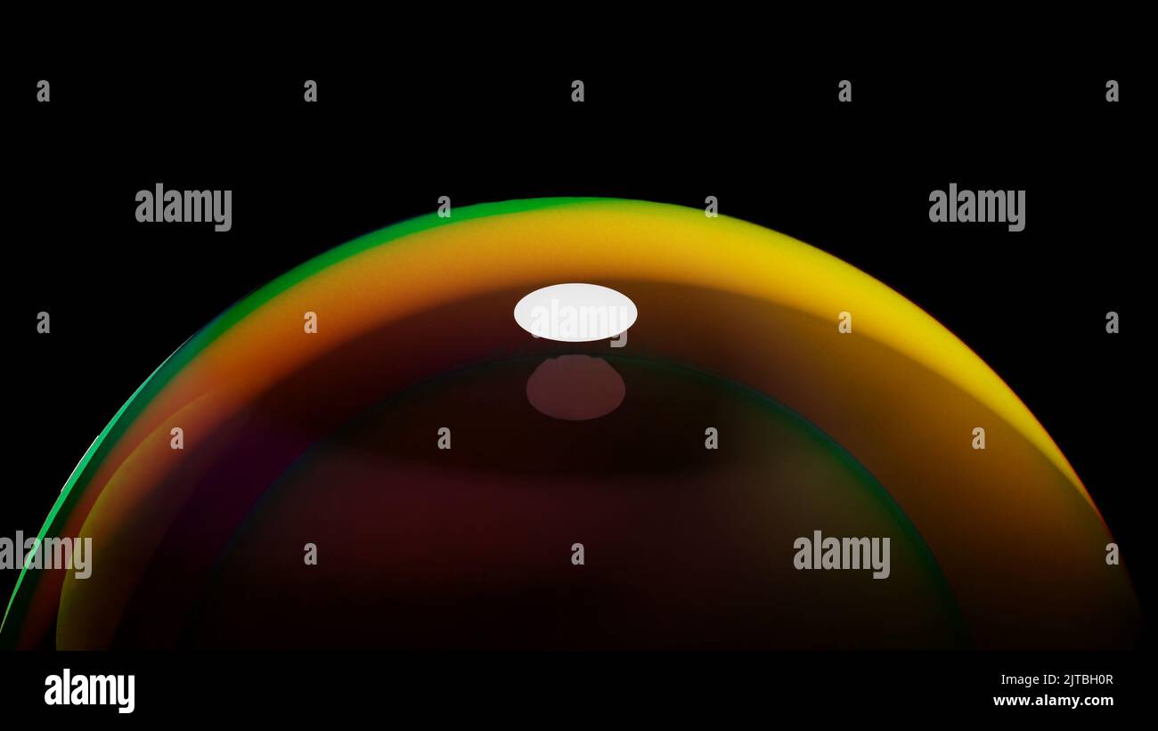 3d rendering. Glass sphere with colors. Giant colored sphere on a black ...