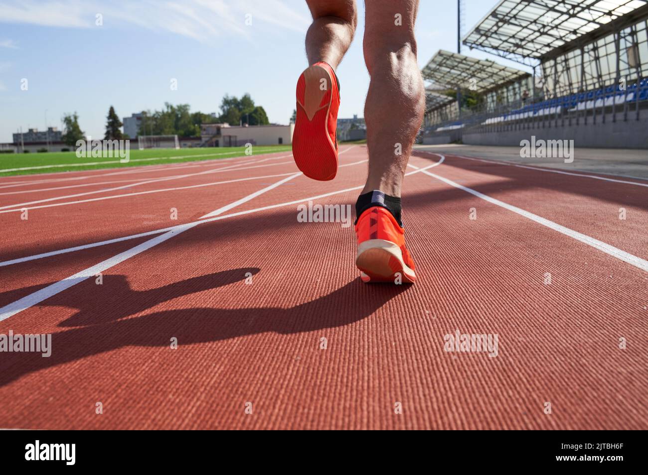 Athlete runner feet running on treadmill closeup on shoe. Concept of ...