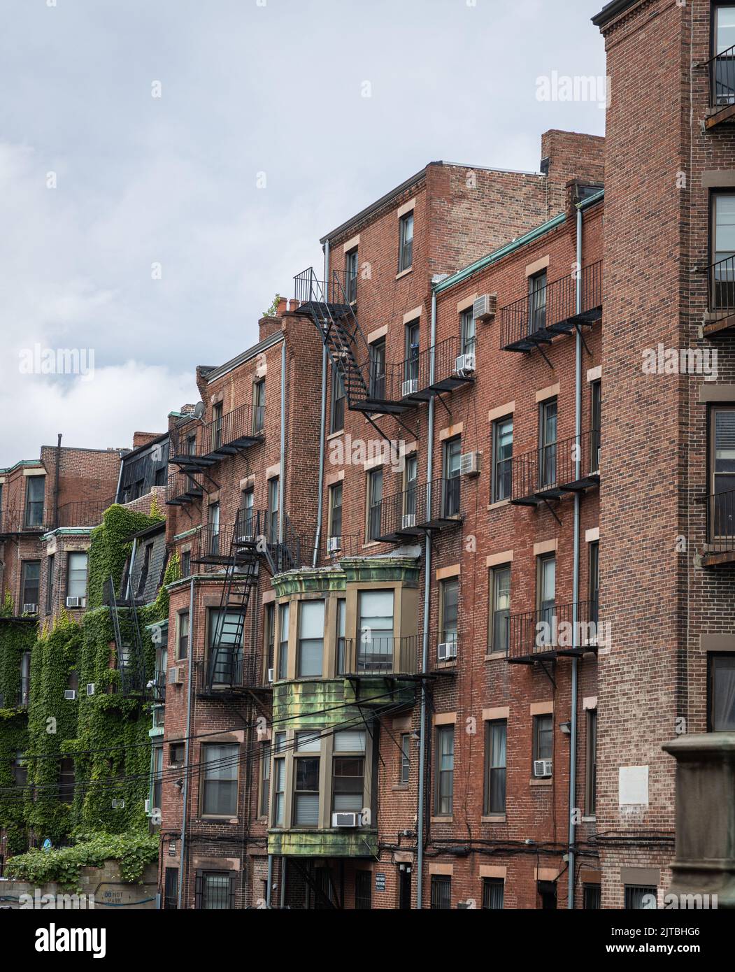 A back of brick buildings with fire escape Stock Photo - Alamy